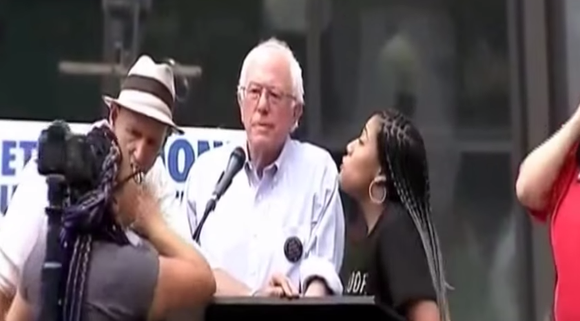 Black Lives Matter Organizers Force Bernie Sanders Off The Stage (VIDEO ...